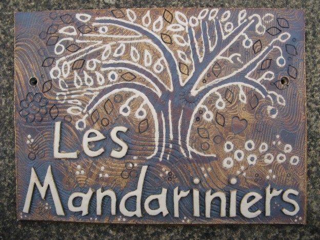 Ceramic house signs designed to your requirements at Bentham Pottery.